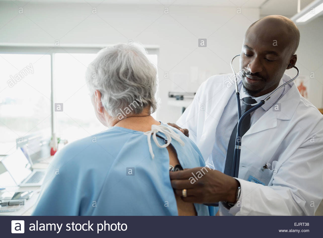 Back mans head sitting on hi-res stock photography and images - Alamy