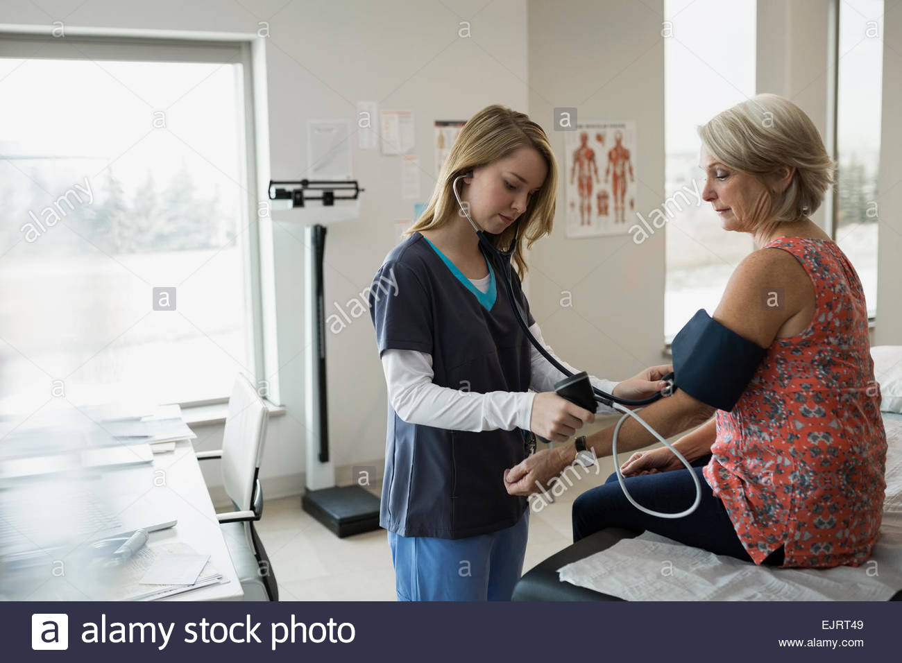 Nurse checking pressure hi-res stock photography and images - Alamy