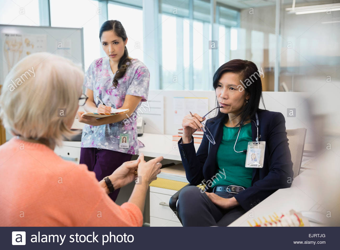 Nurse listening patient consultation hi-res stock photography and ...