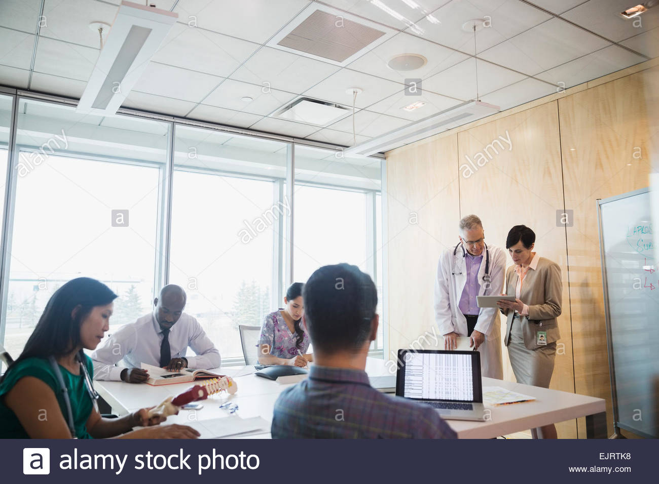Hospital group meeting table hi-res stock photography and images - Alamy