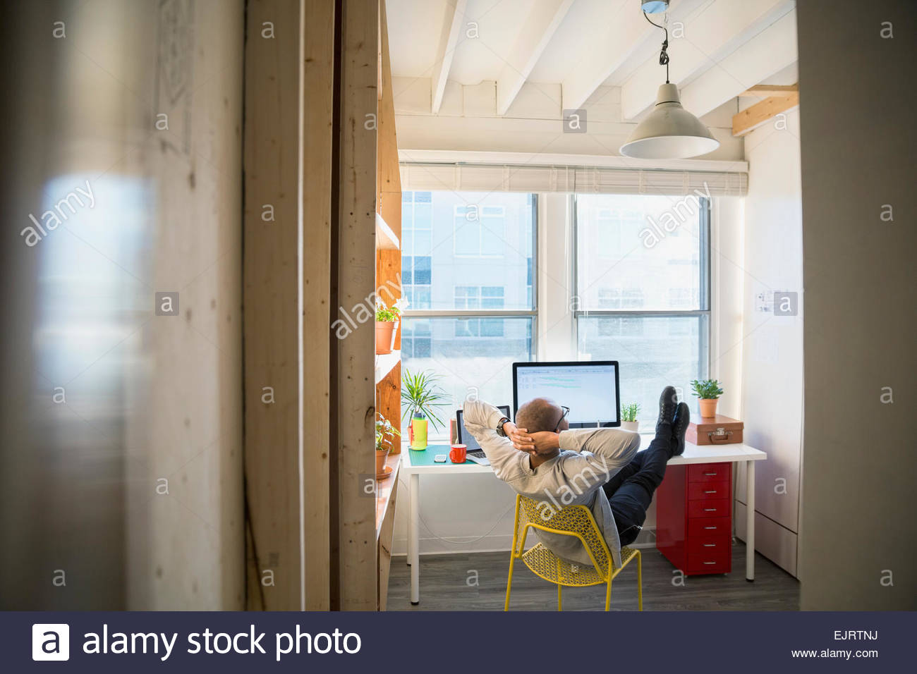 Feet on desk hi-res stock photography and images - Alamy