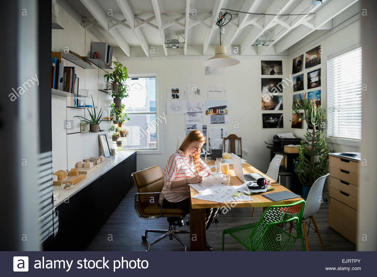 Architect drafting blueprints in office Stock Photo - Alamy