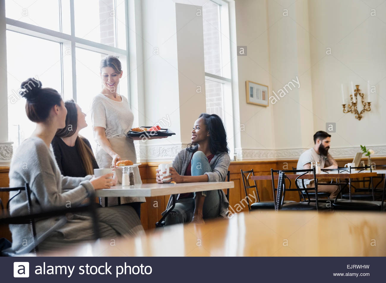 Cafe woman server hi-res stock photography and images - Alamy