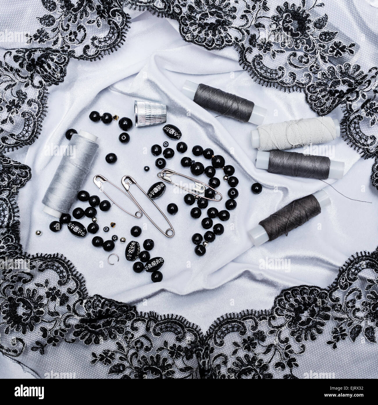 Handicrafts background. Thread, pins, thimbles Stock Photo - Alamy