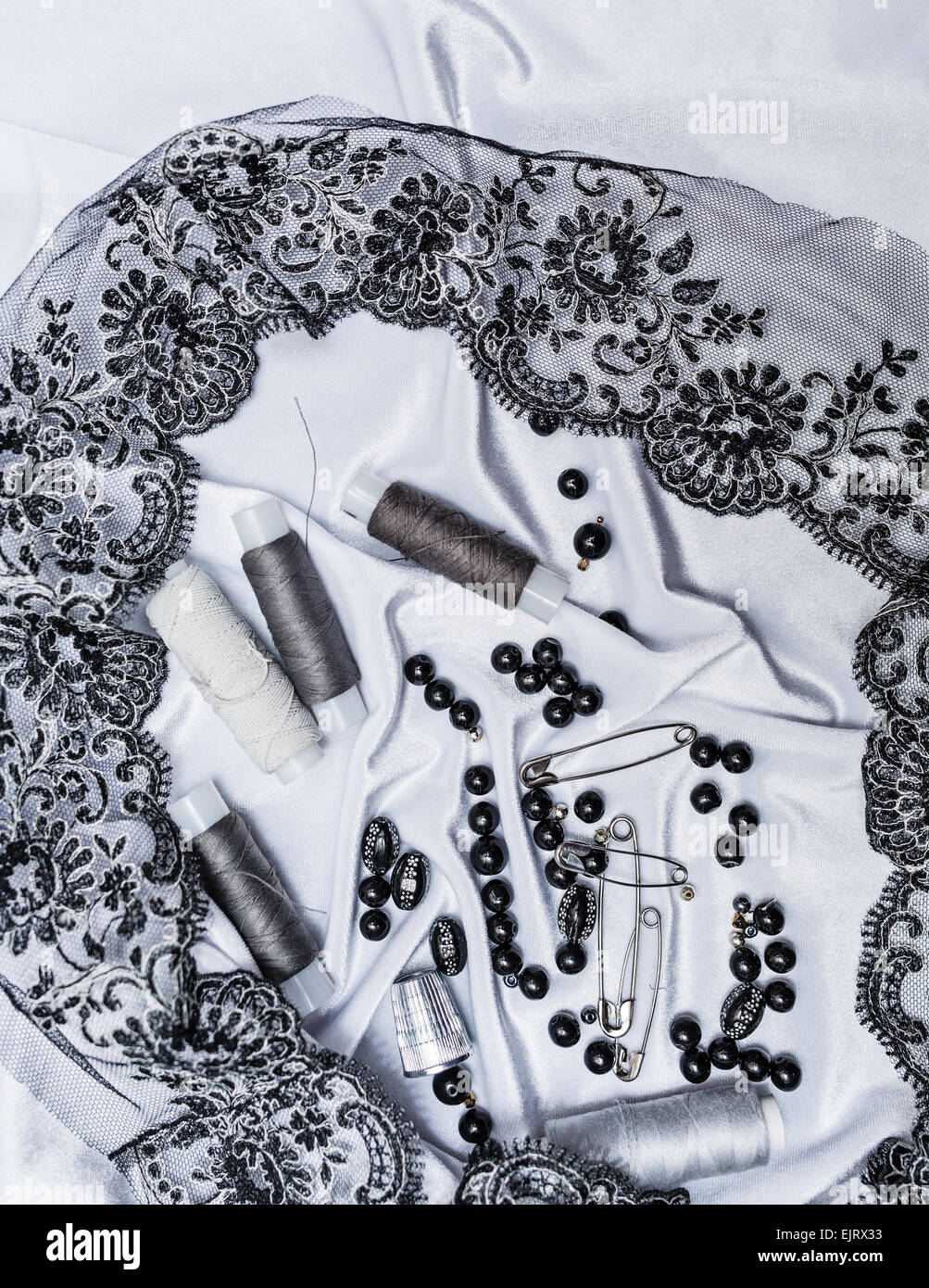 Handicrafts background. Thread, pins, thimbles Stock Photo - Alamy