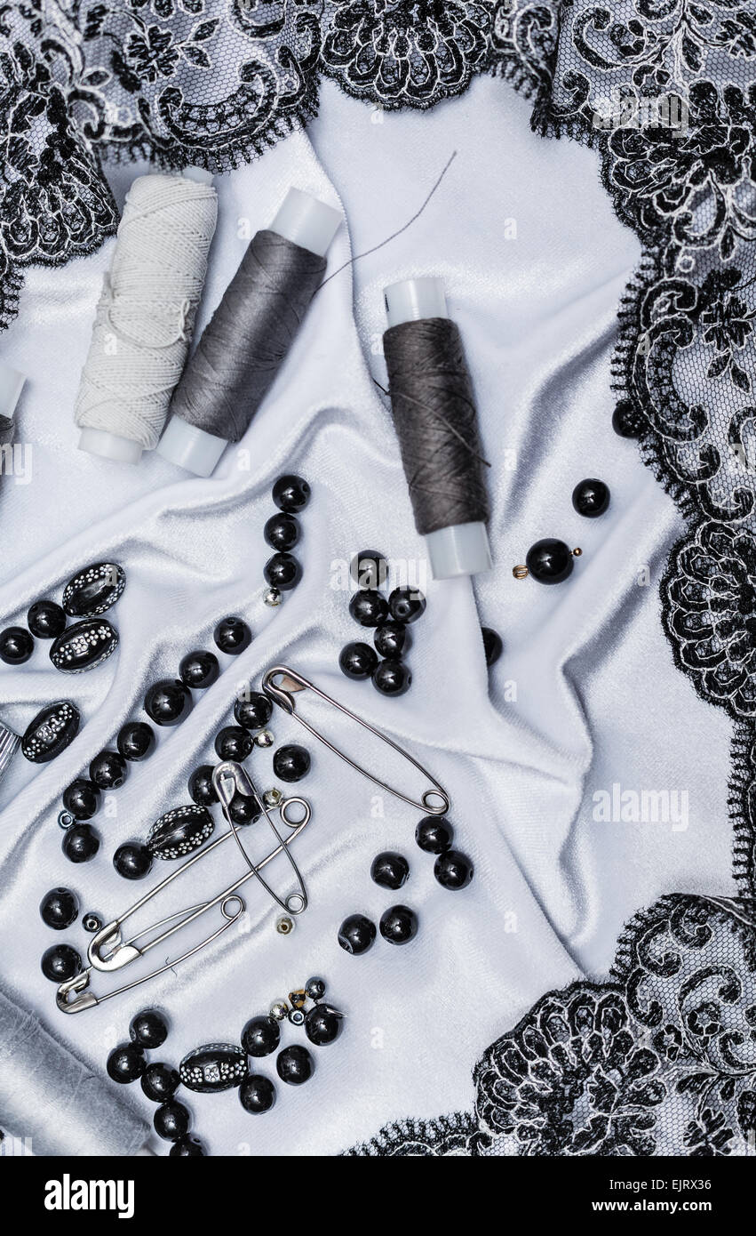 Handicrafts background. Thread, pins, thimbles Stock Photo - Alamy