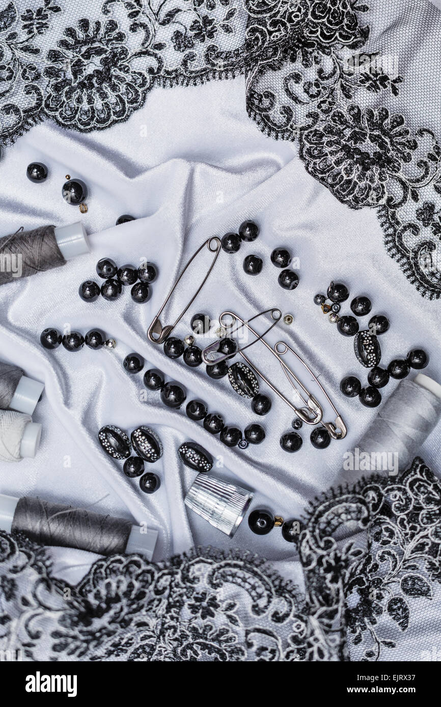 Handicrafts background. Thread, pins, thimbles Stock Photo - Alamy