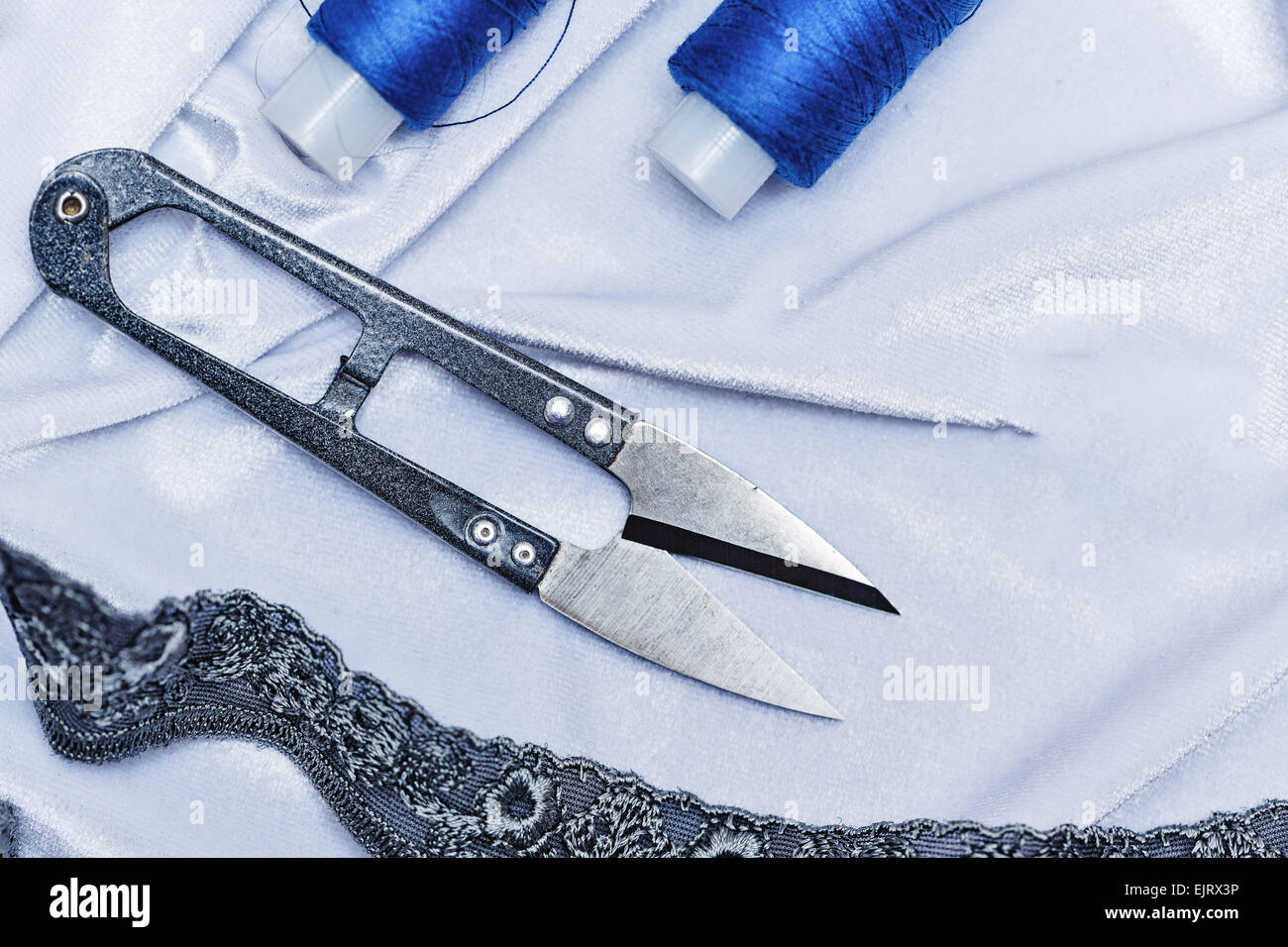 Scissors, thread, pins, silk fabric. Handicrafts abstraction Stock ...