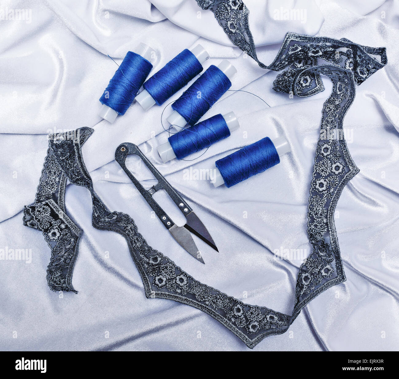 Scissors, thread, pins, silk fabric. Handicrafts abstraction Stock ...