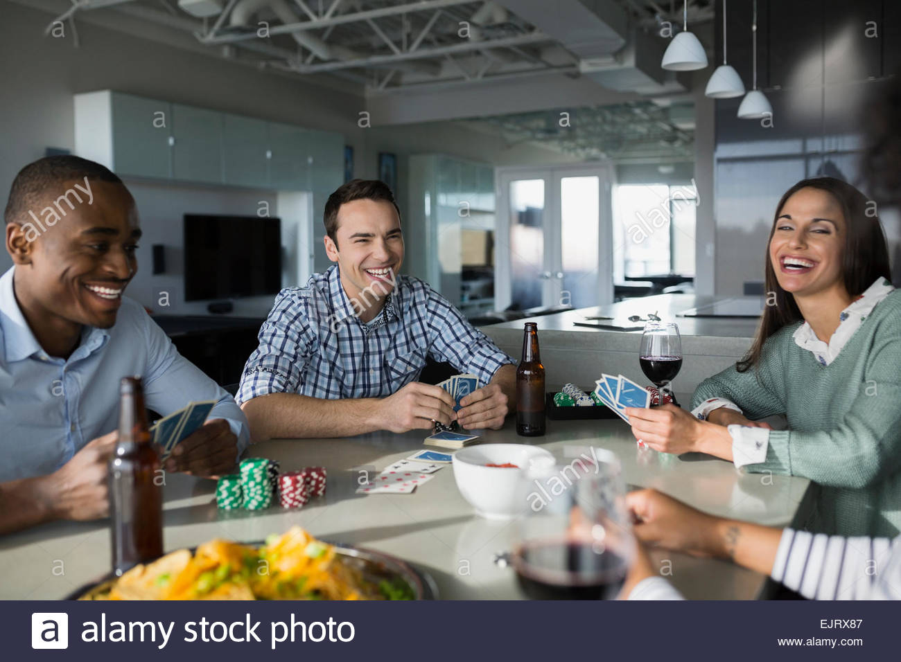 People sitting poker table playing hi-res stock photography and images ...
