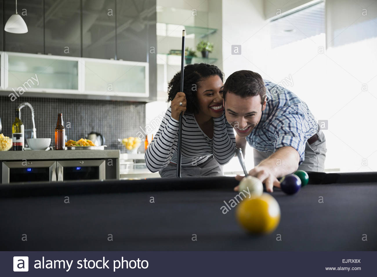 Couple at pool table hi-res stock photography and images - Alamy