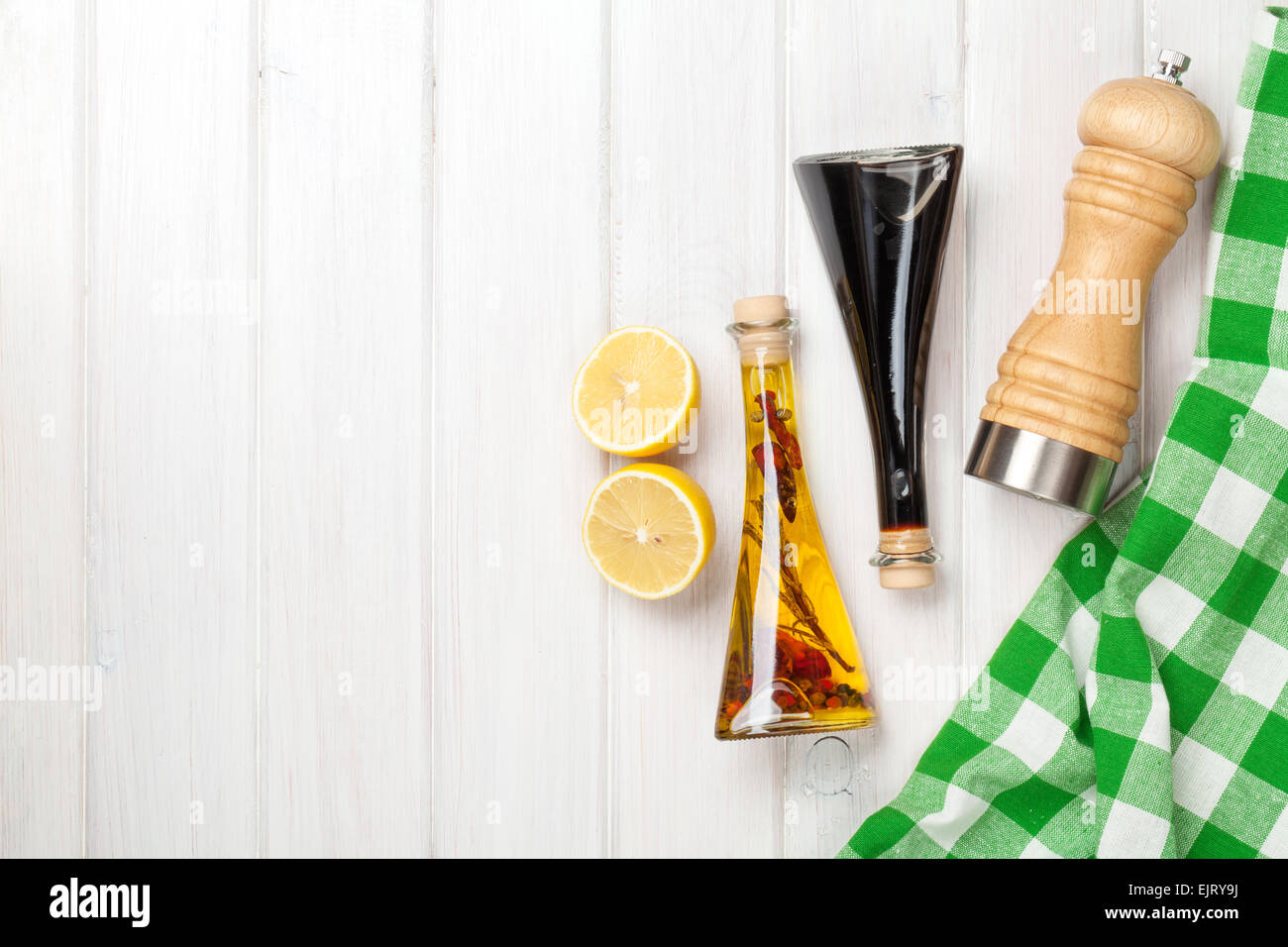 Condiments and spices over white wooden table with copy space Stock ...