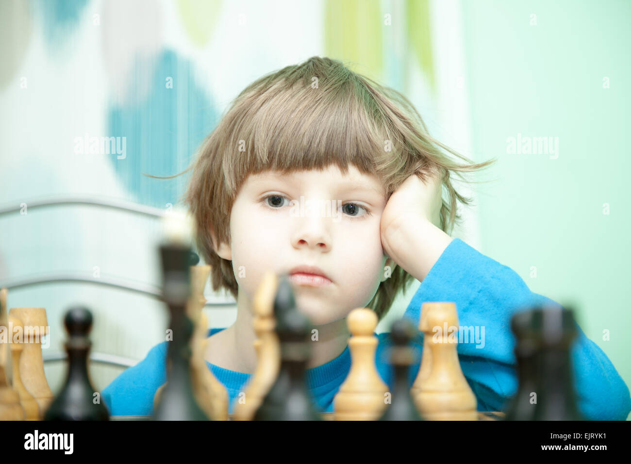 Learning to play a strategic game of chess hi-res stock photography and ...