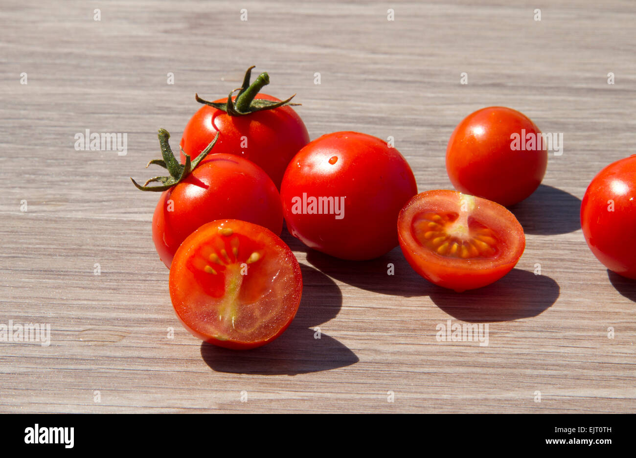 photo of fresh tomatos background Stock Photo - Alamy