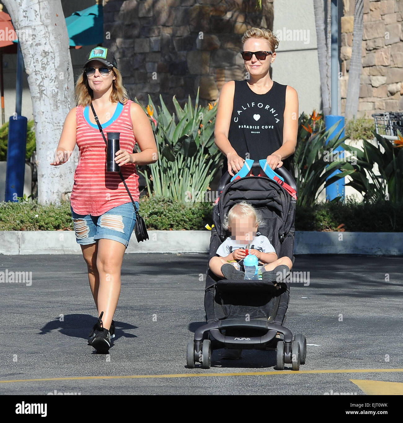 Malin Akerman out with her son Sebastian Zincone and a female companion ...
