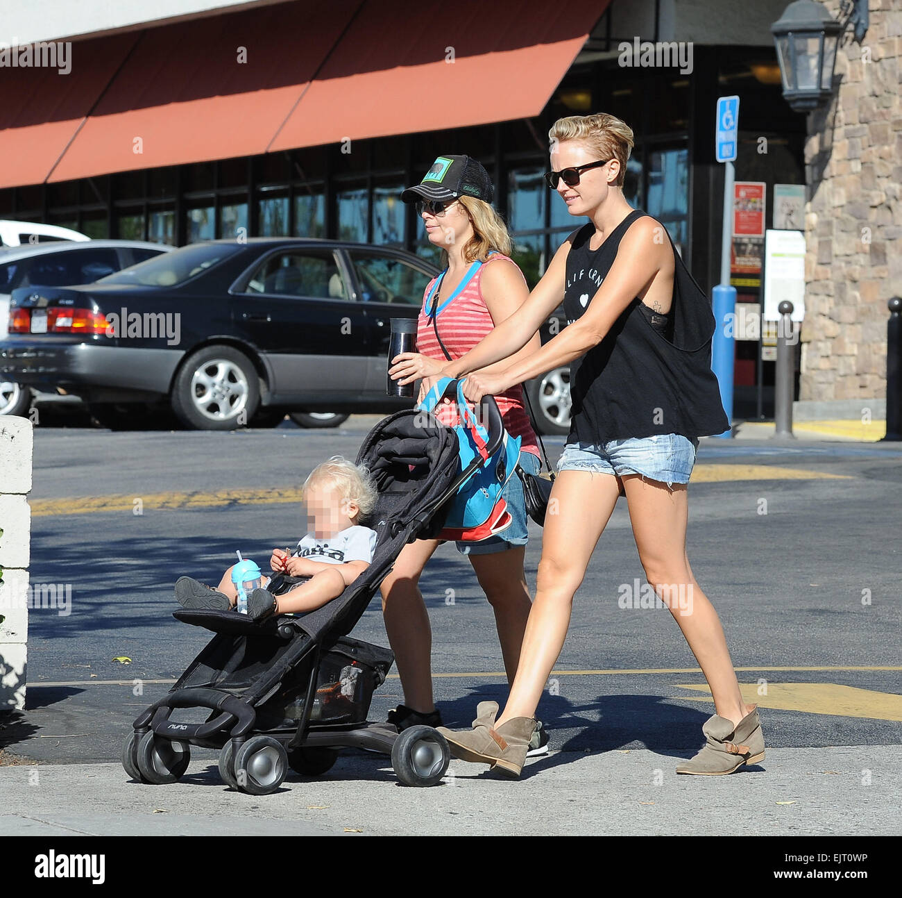Malin Akerman out with her son Sebastian Zincone and a female companion ...