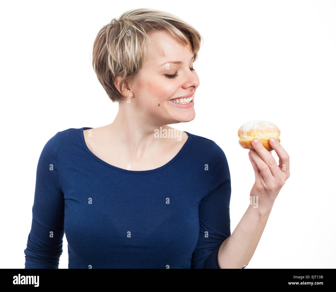 Young woman about to eat a donut, isolated on white Stock Photo - Alamy