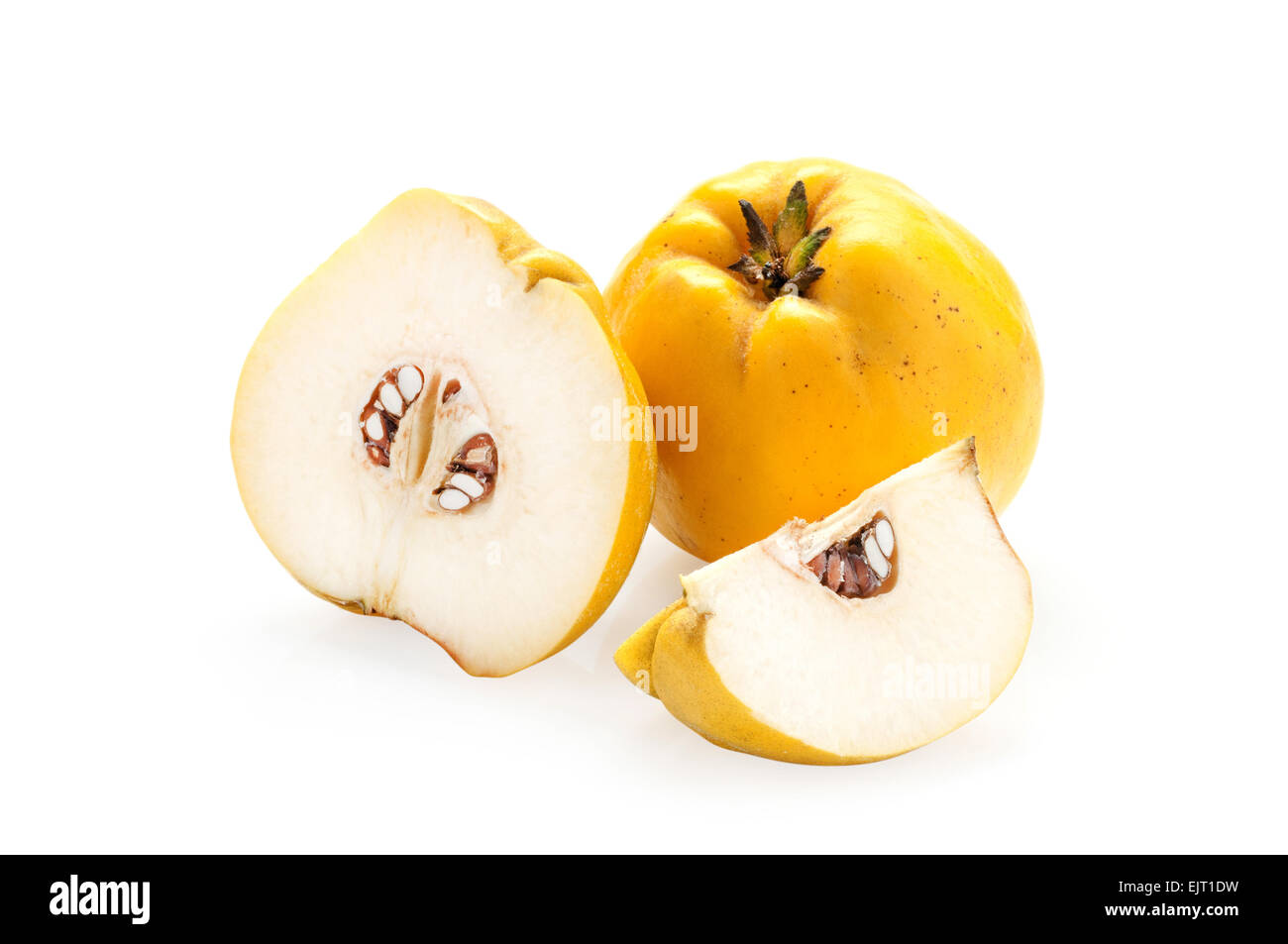 Quince with slices on a white background Stock Photo - Alamy