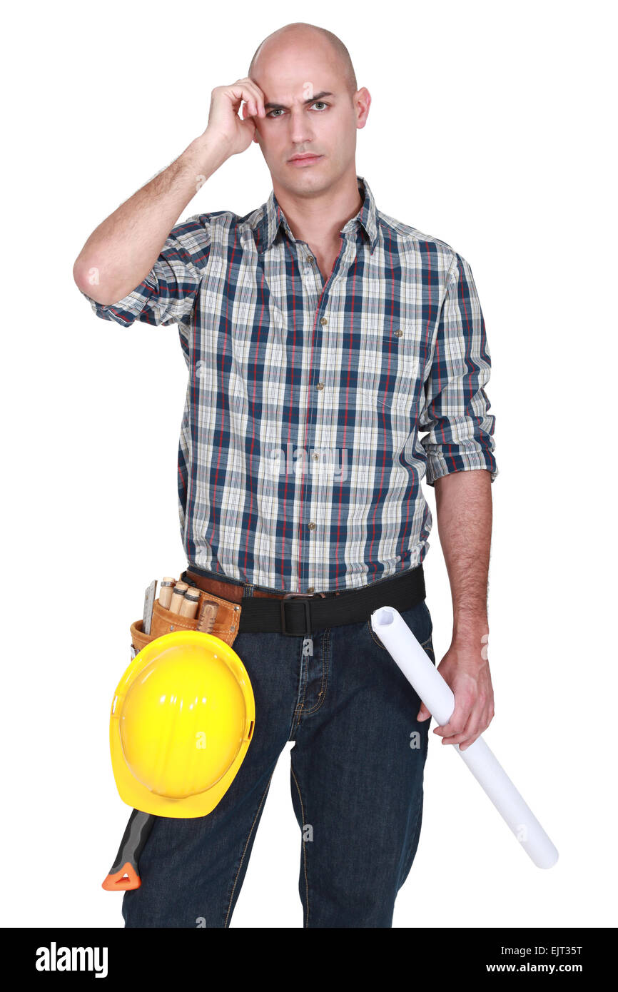 Engineer scratching his bald head Stock Photo - Alamy