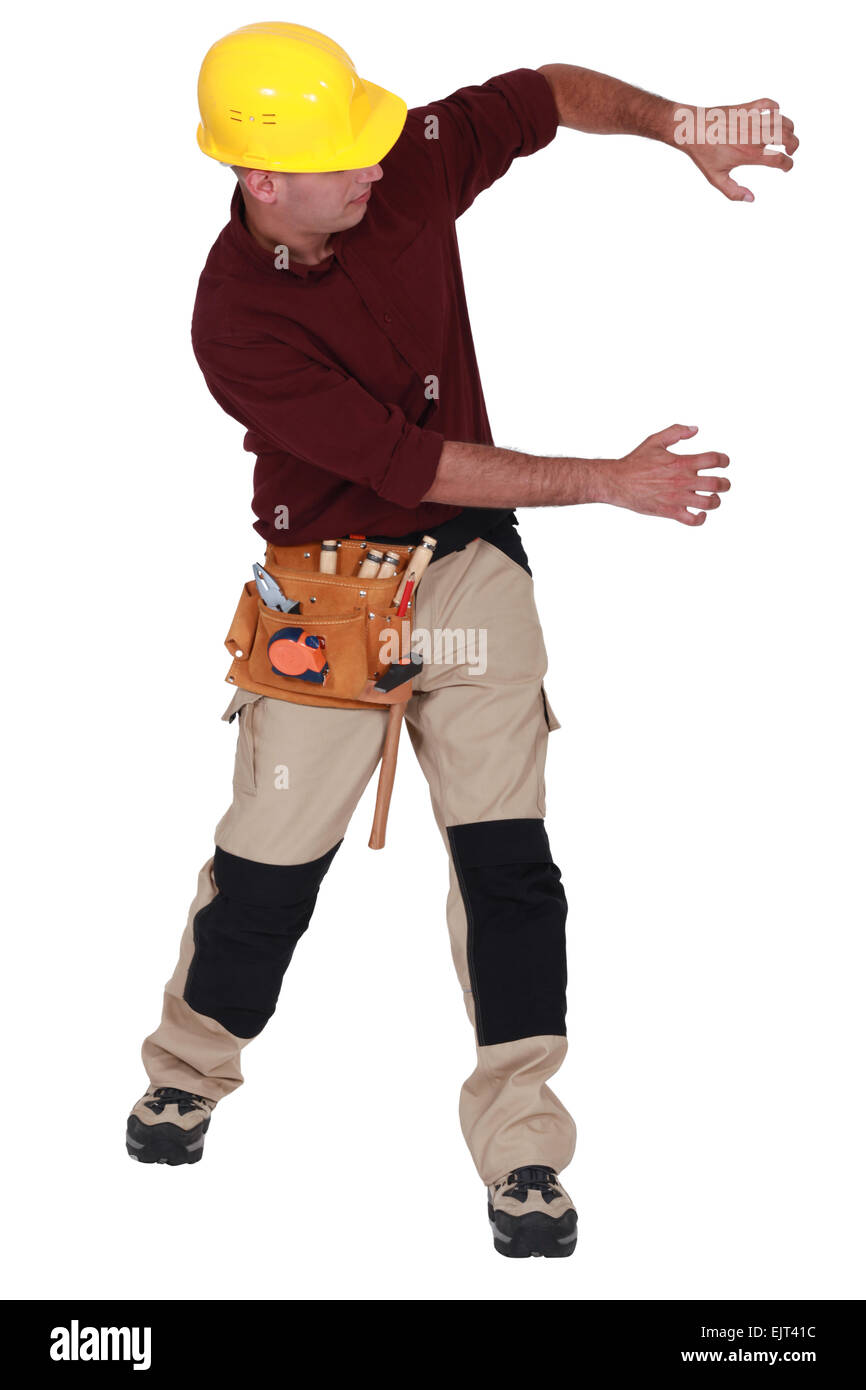 Manual worker in studio Stock Photo - Alamy