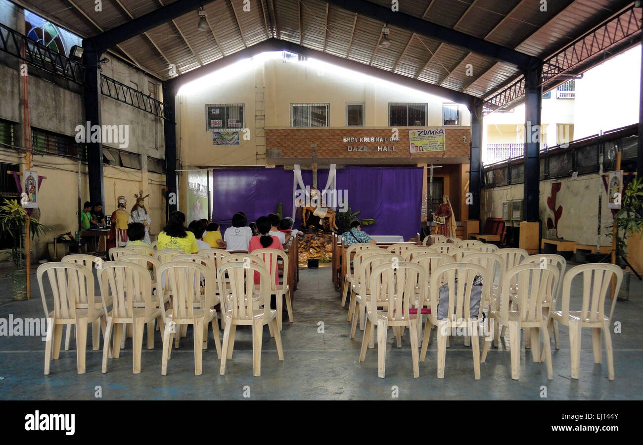 Filipino Catholics congregate in prayer as they start the 'pabasa ...