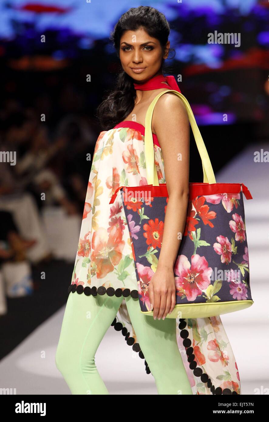Karachi. 31st Mar, 2015. A model presents a creation by designer Madiha ...