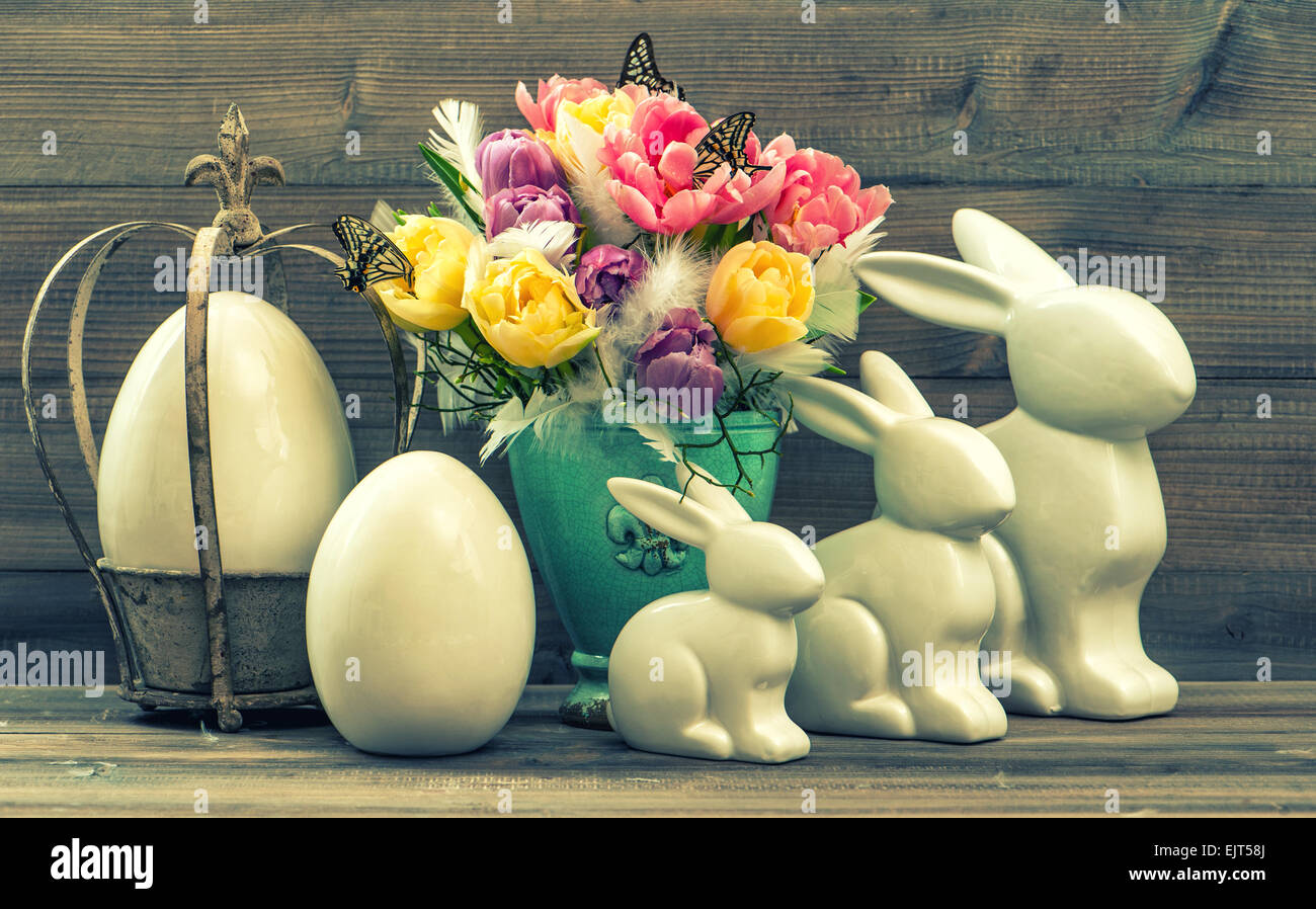 Vintage decoration with tulip flowers, easter eggs and bunnies. Retro ...