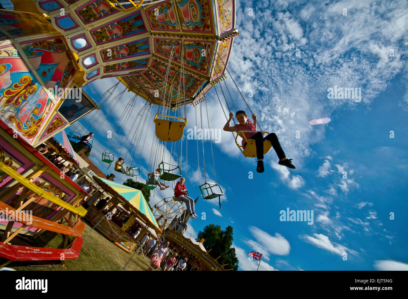 An old fashioned fun fair on an English summer's day Stock Photo - Alamy