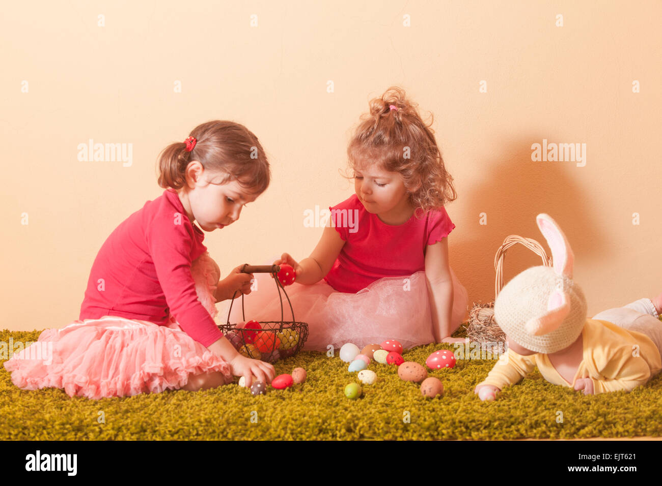 Girls on an Easter Egg hunt Stock Photo - Alamy