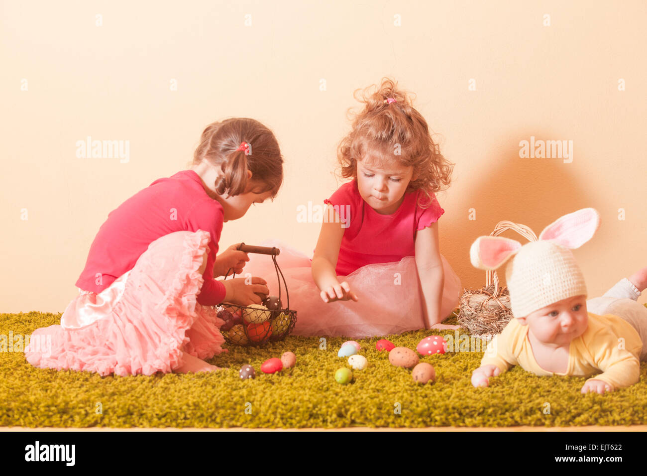 Girls on an Easter Egg hunt Stock Photo - Alamy