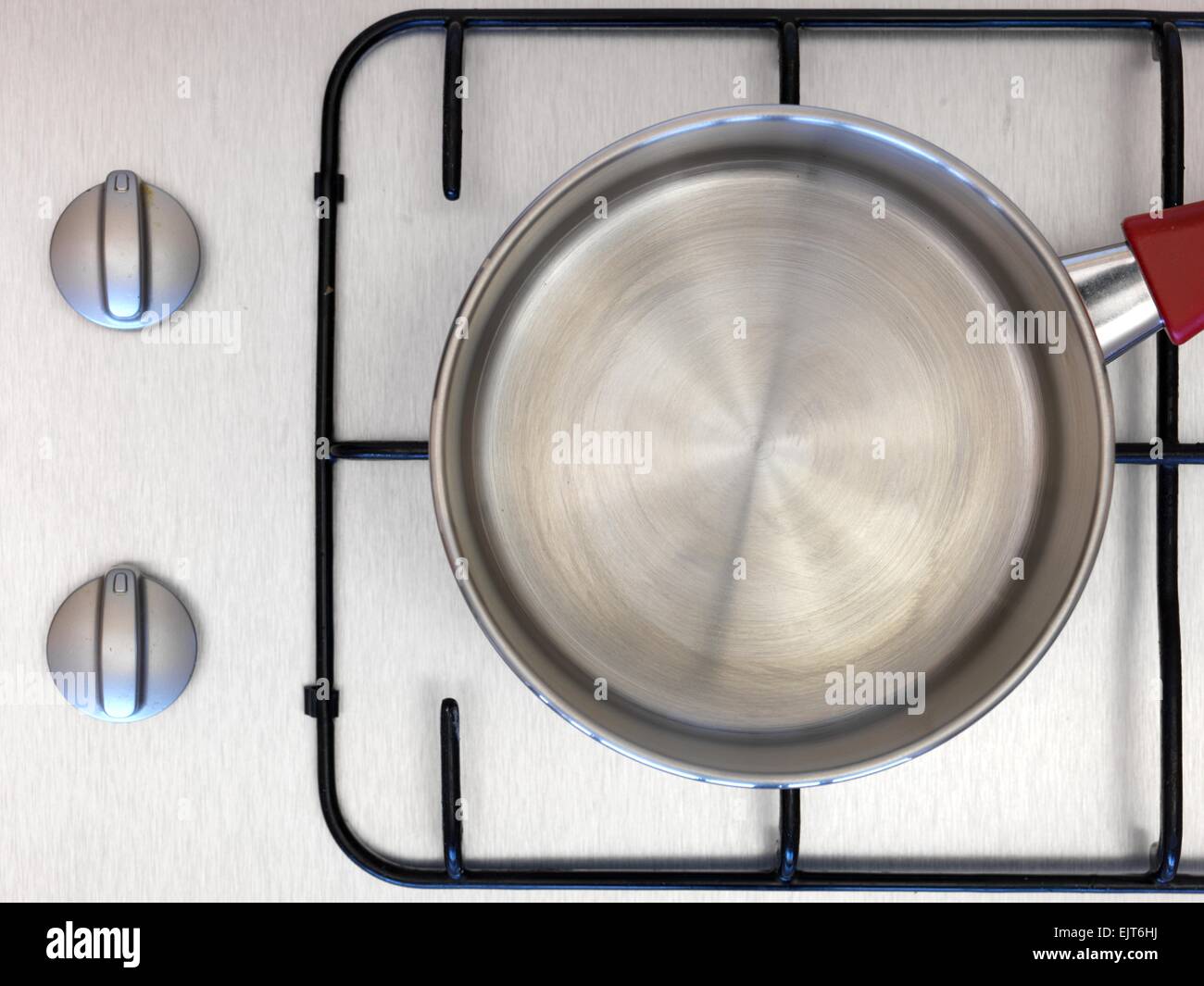 A cooking pot isolated on a stove top Stock Photo - Alamy