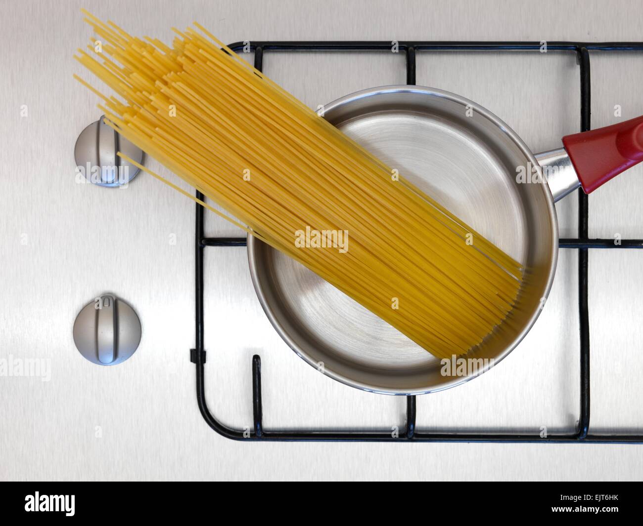 A cooking pot isolated on a stove top Stock Photo - Alamy