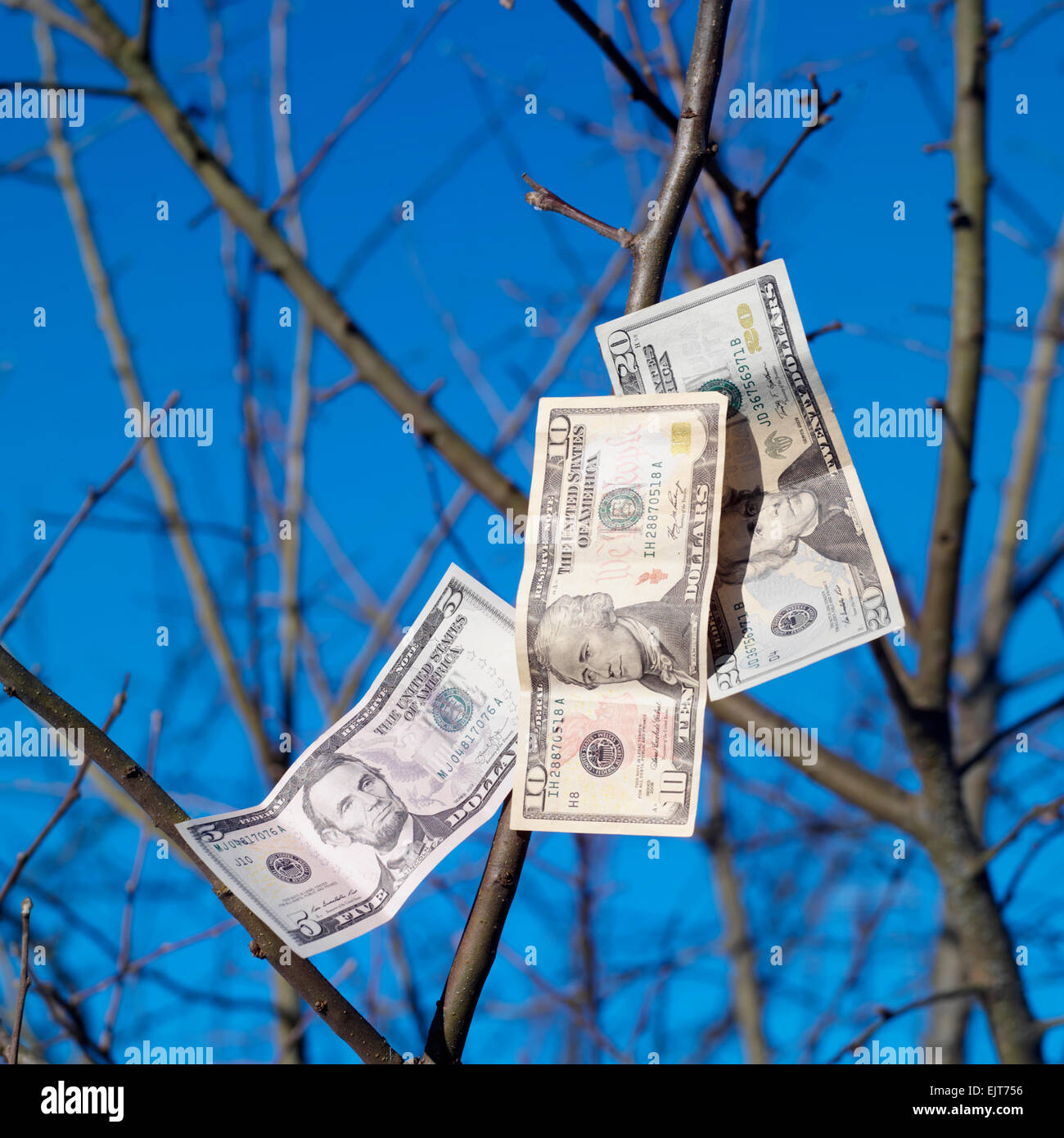 US currency falling down Stock Photo - Alamy