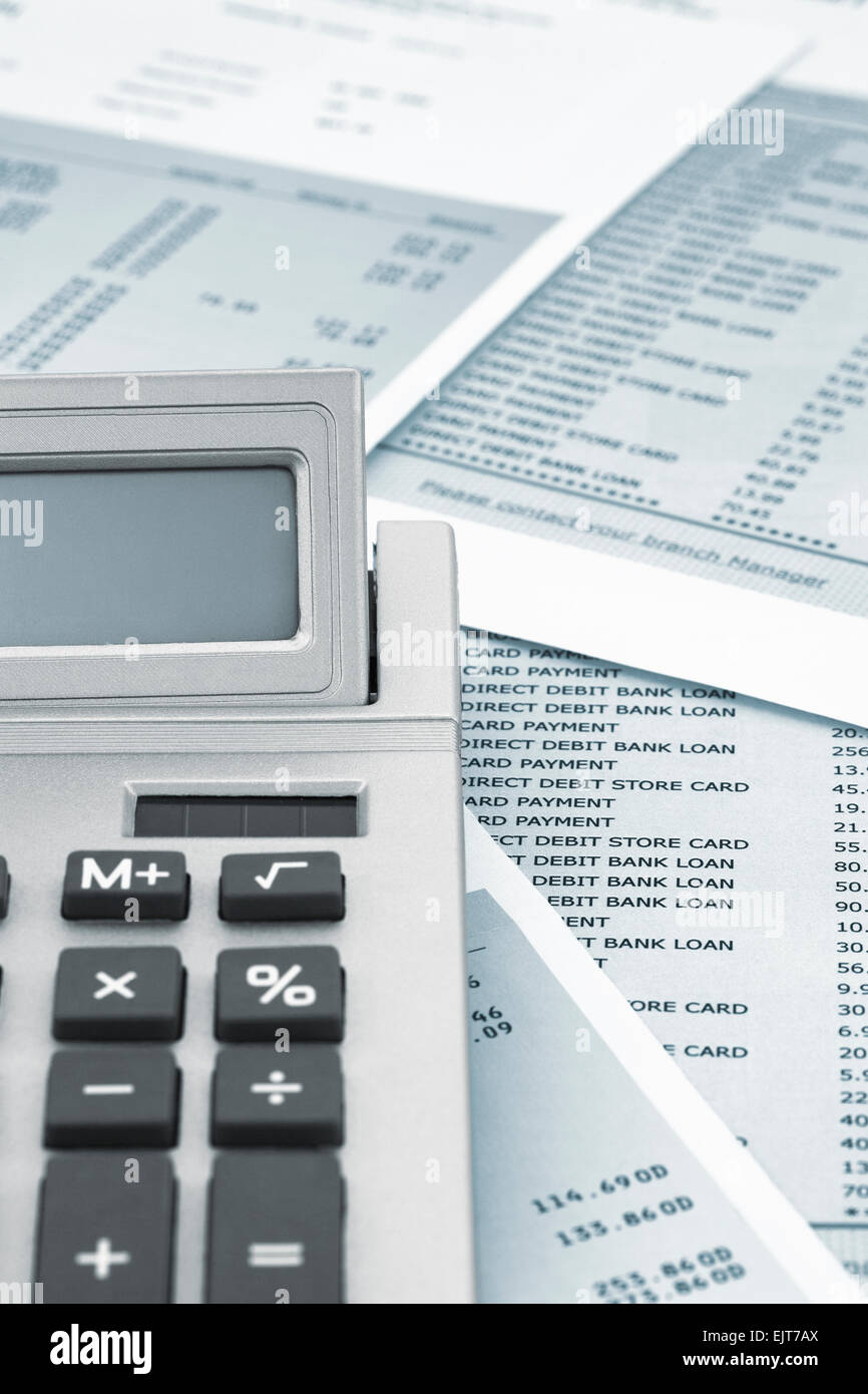 Close up of a calculator on a bank statement Stock Photo - Alamy
