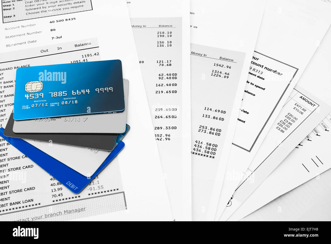 Selection of Credit Cards on top of Bank Statements Stock Photo - Alamy
