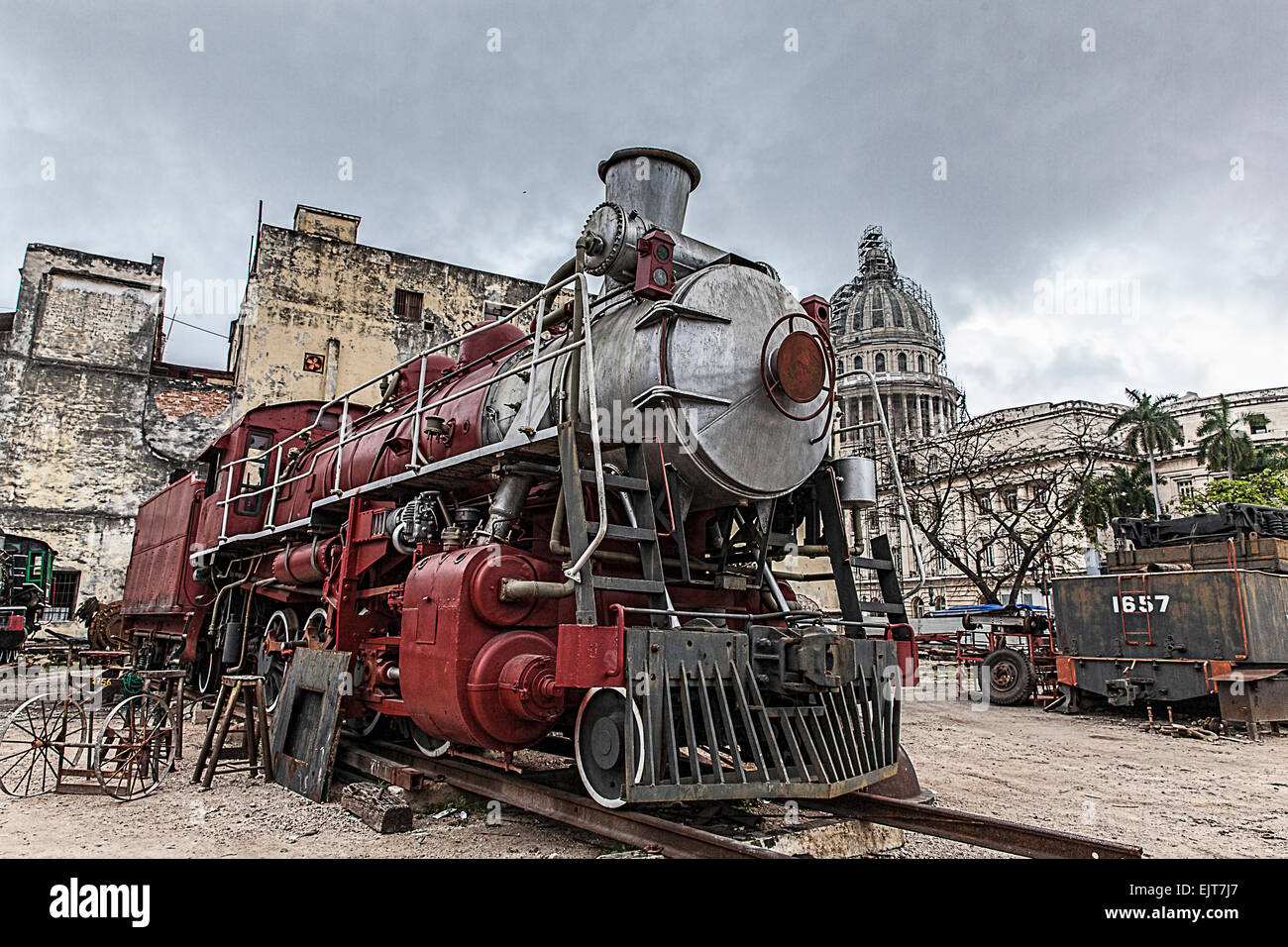 Old American steam engine being restored in an old railway yard in ...