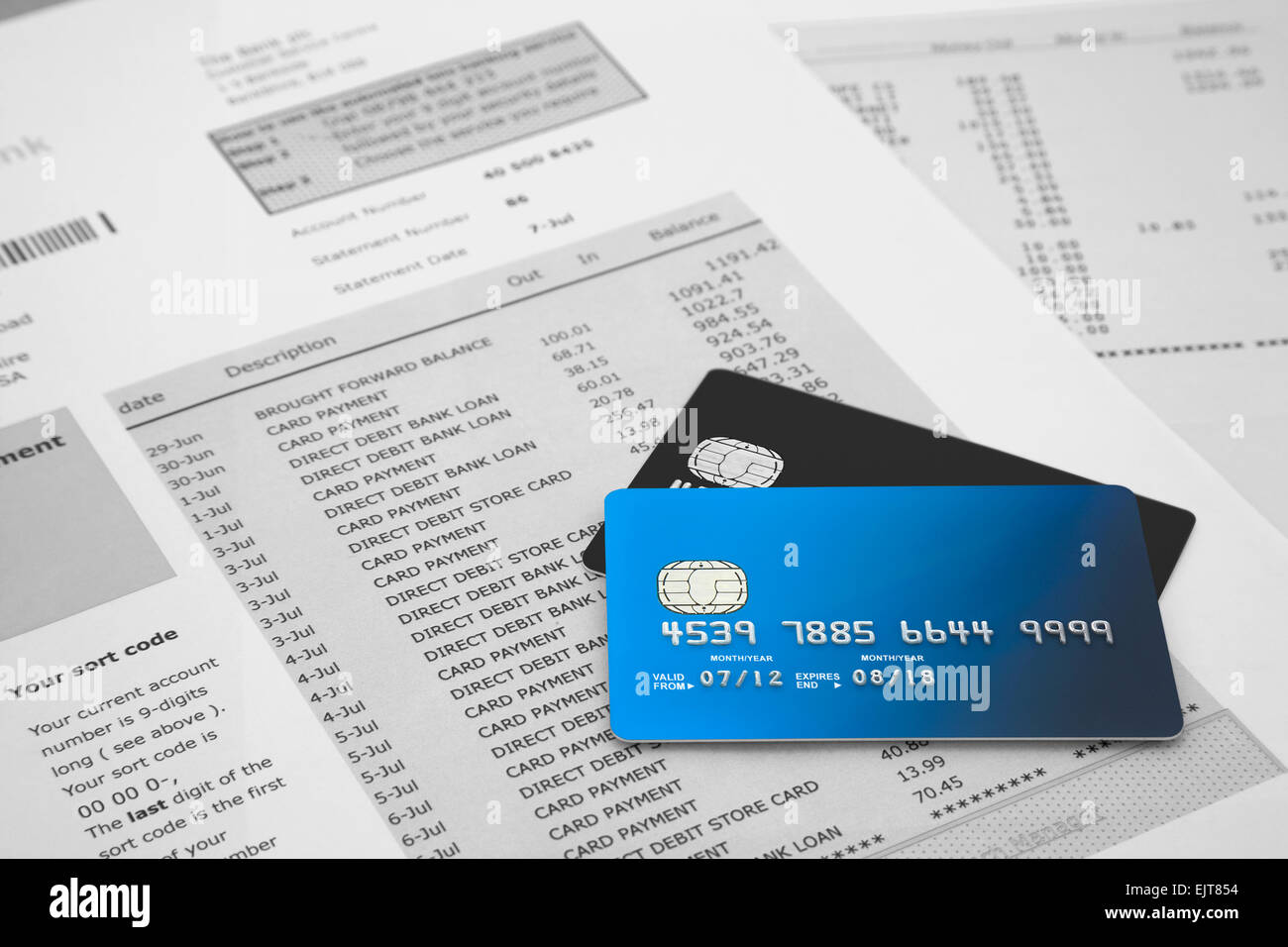 Selection of Credit Cards on top of Bank Statements Stock Photo - Alamy