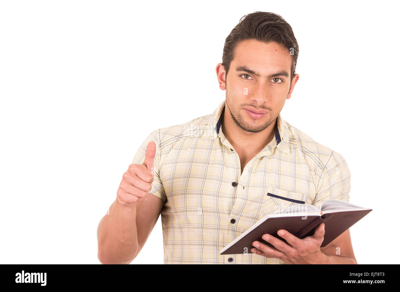 young handsome male teacher holding notebook Stock Photo - Alamy