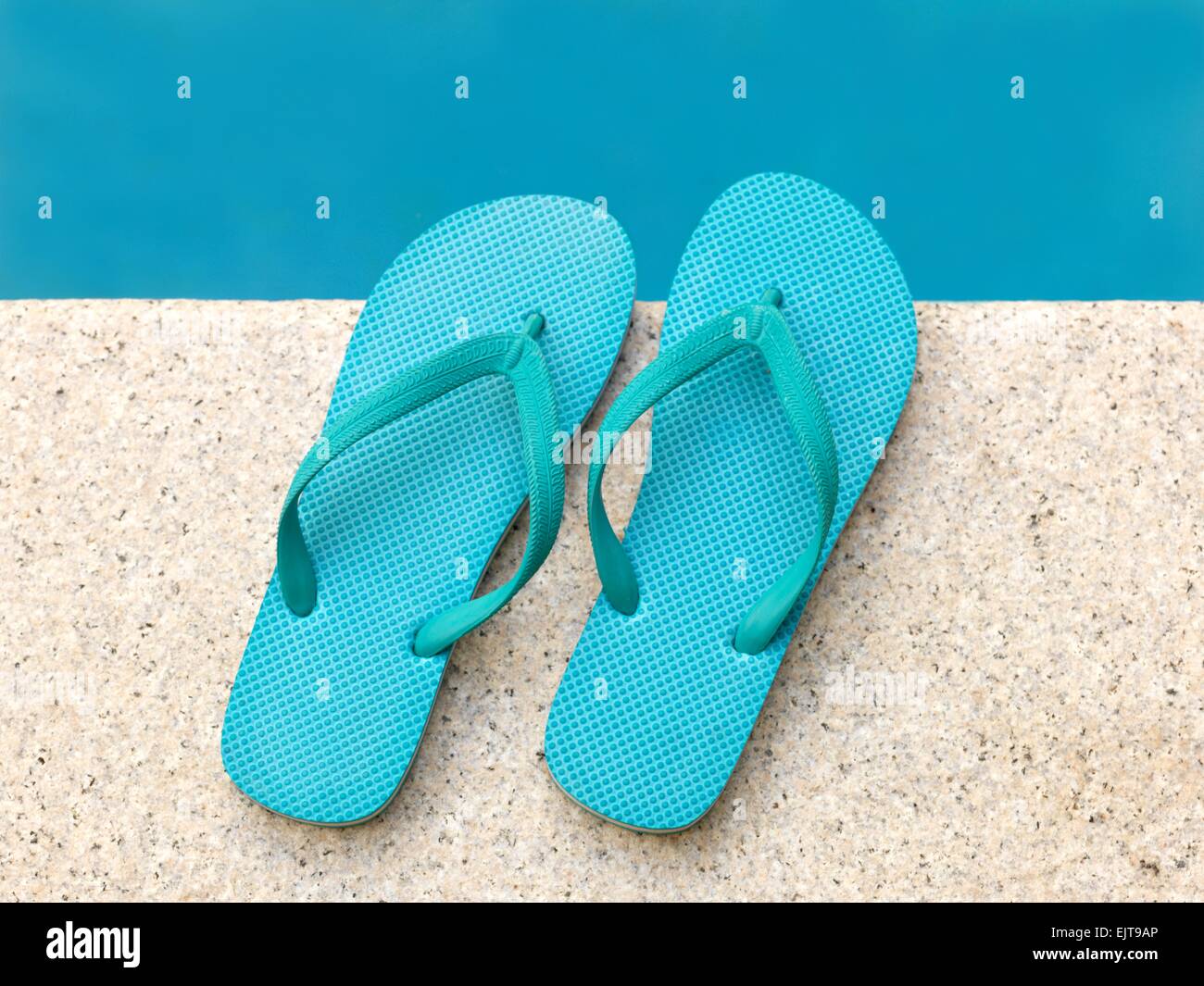 A close up shot of pool side items Stock Photo - Alamy