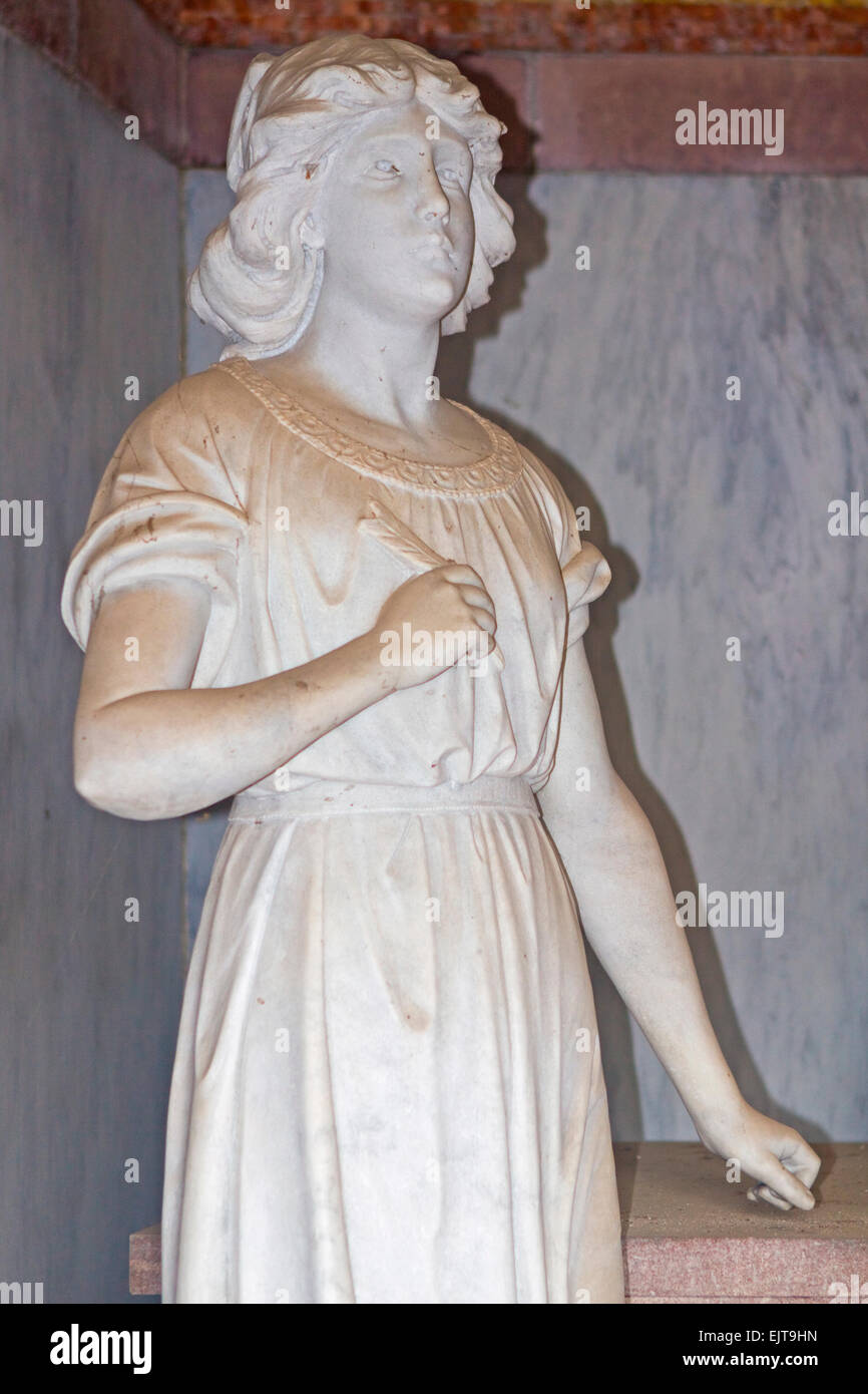 A female statue in a mausoleum at Glenwood Cemetery in Washington, DC ...
