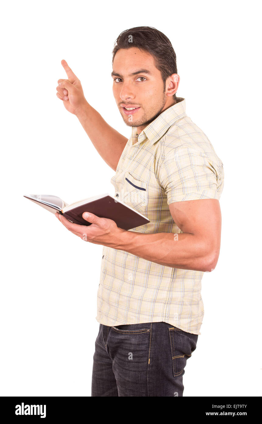 young handsome male teacher holding notebook Stock Photo - Alamy
