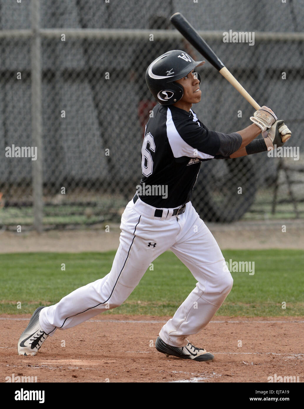 Usa. 31st Mar, 2015. Sports -- Volcano Vista's Chris Padilla hits a ...