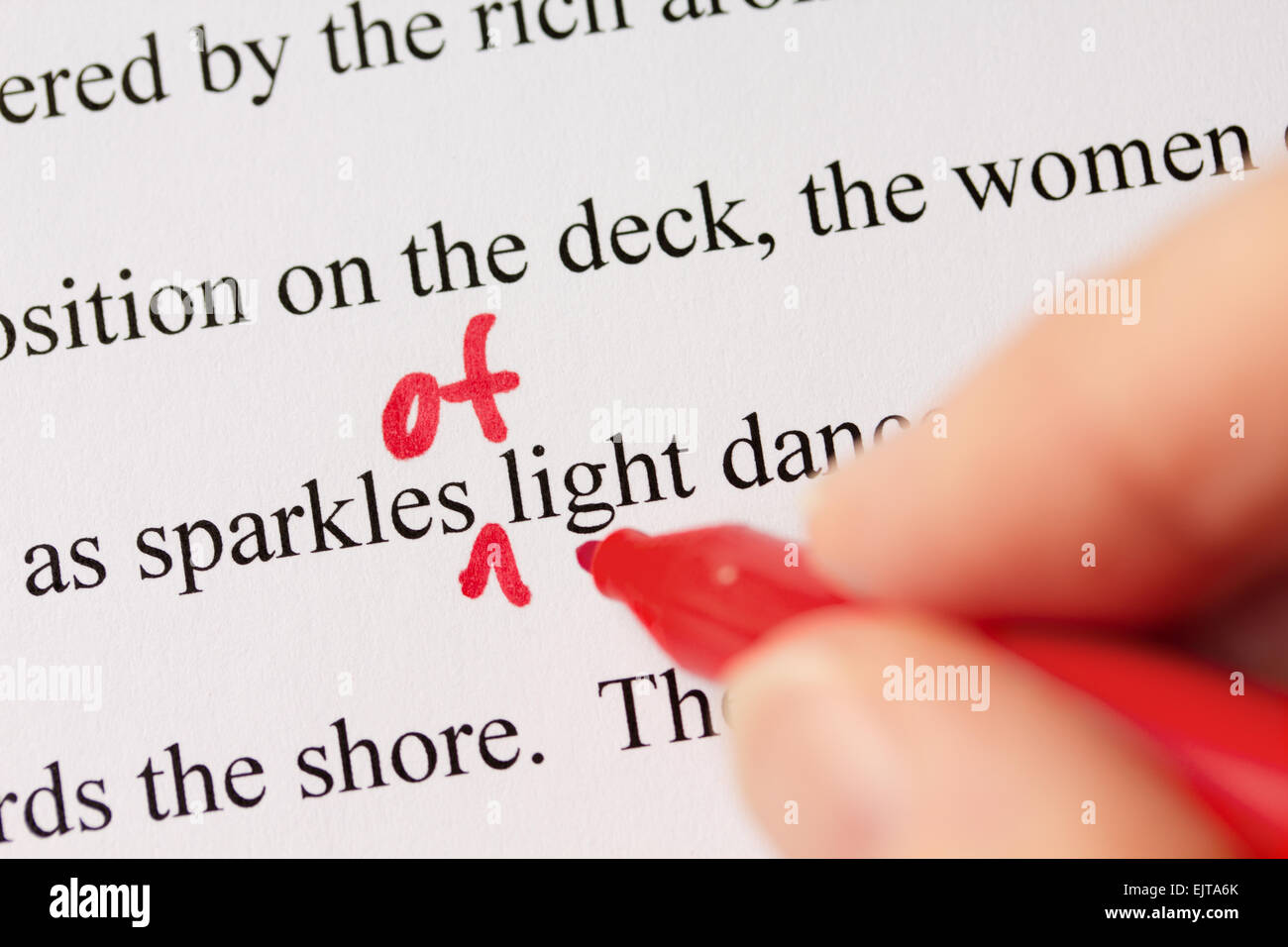Hand with Red Pen Proofreading Document Text Closeup Stock Photo - Alamy