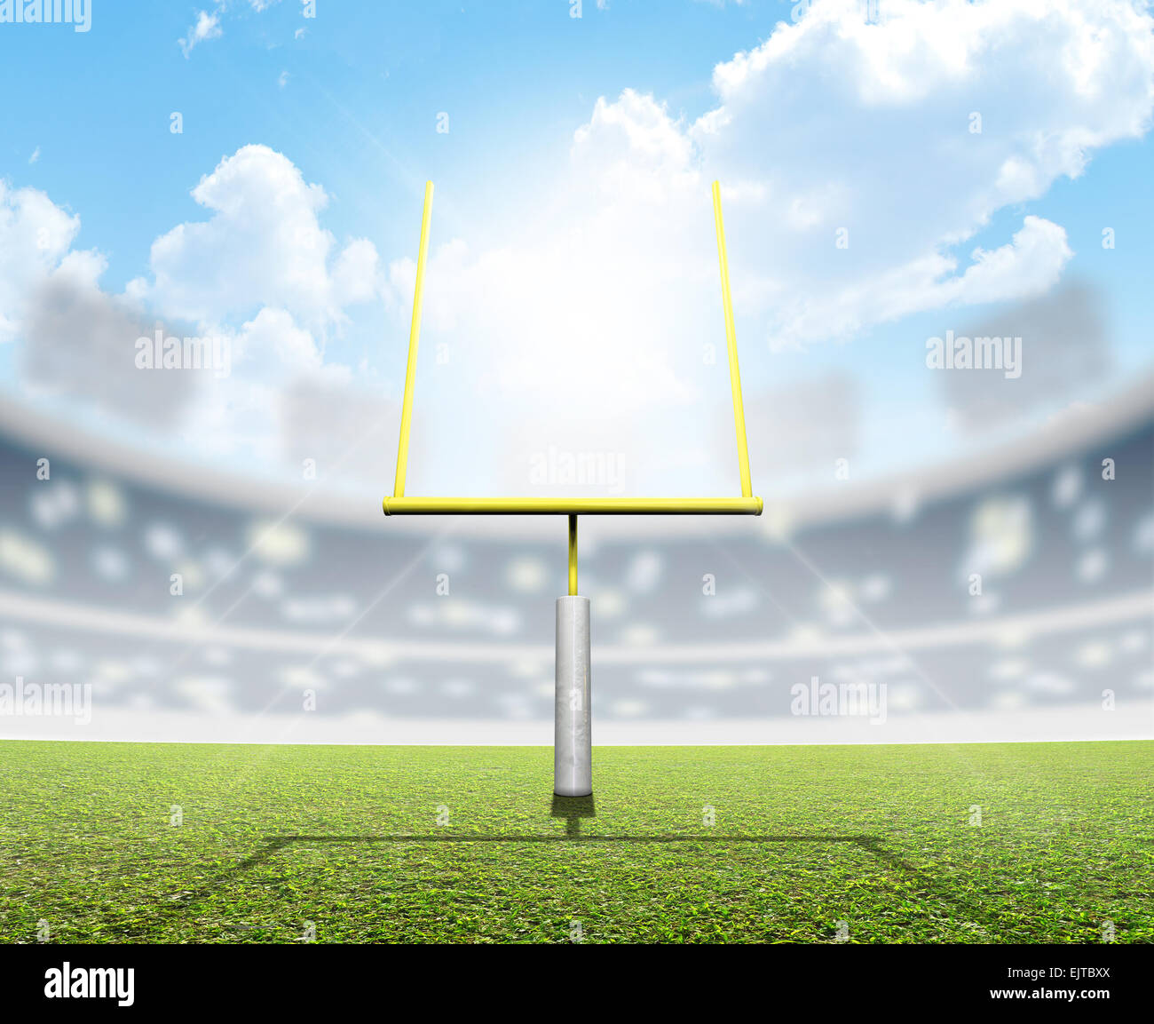 A football stadium with posts on a marked green grass pitch in the ...