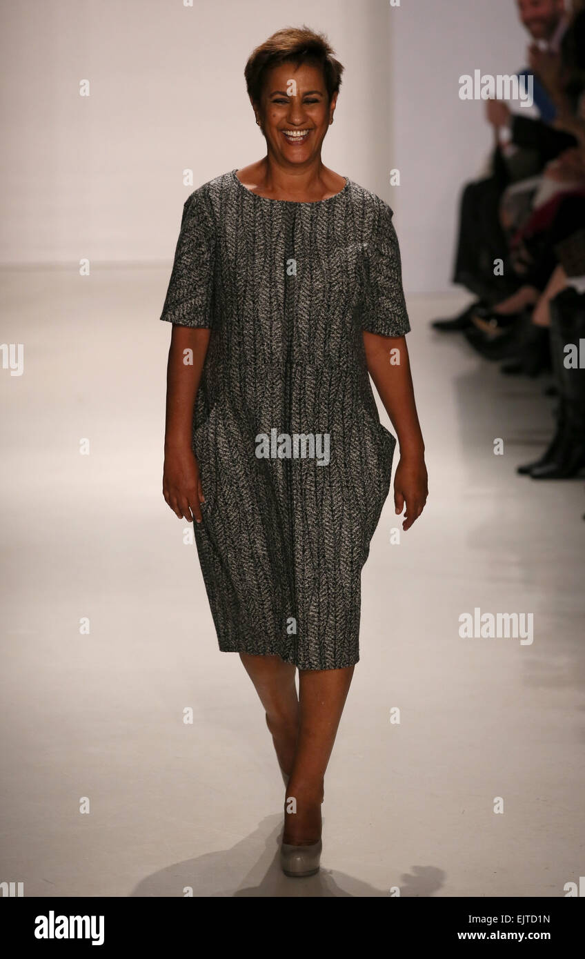 Designer Amsale Aberra walks runway at Amsale fashion show during Fall ...