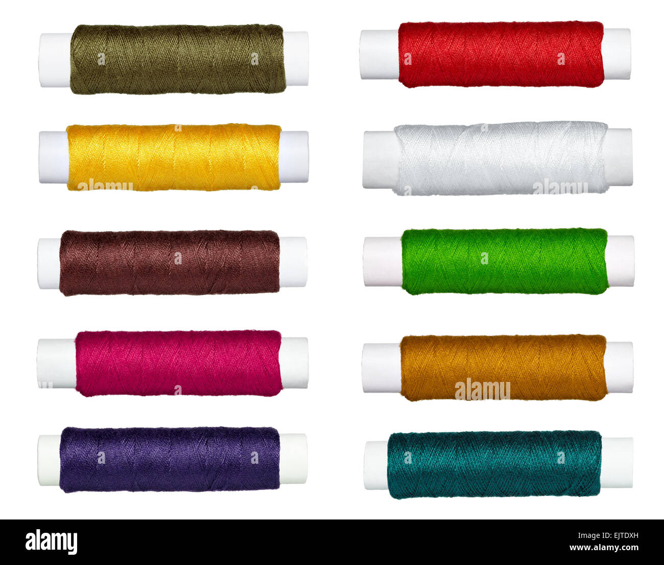 collection of various sewing threads on on white background. each one ...