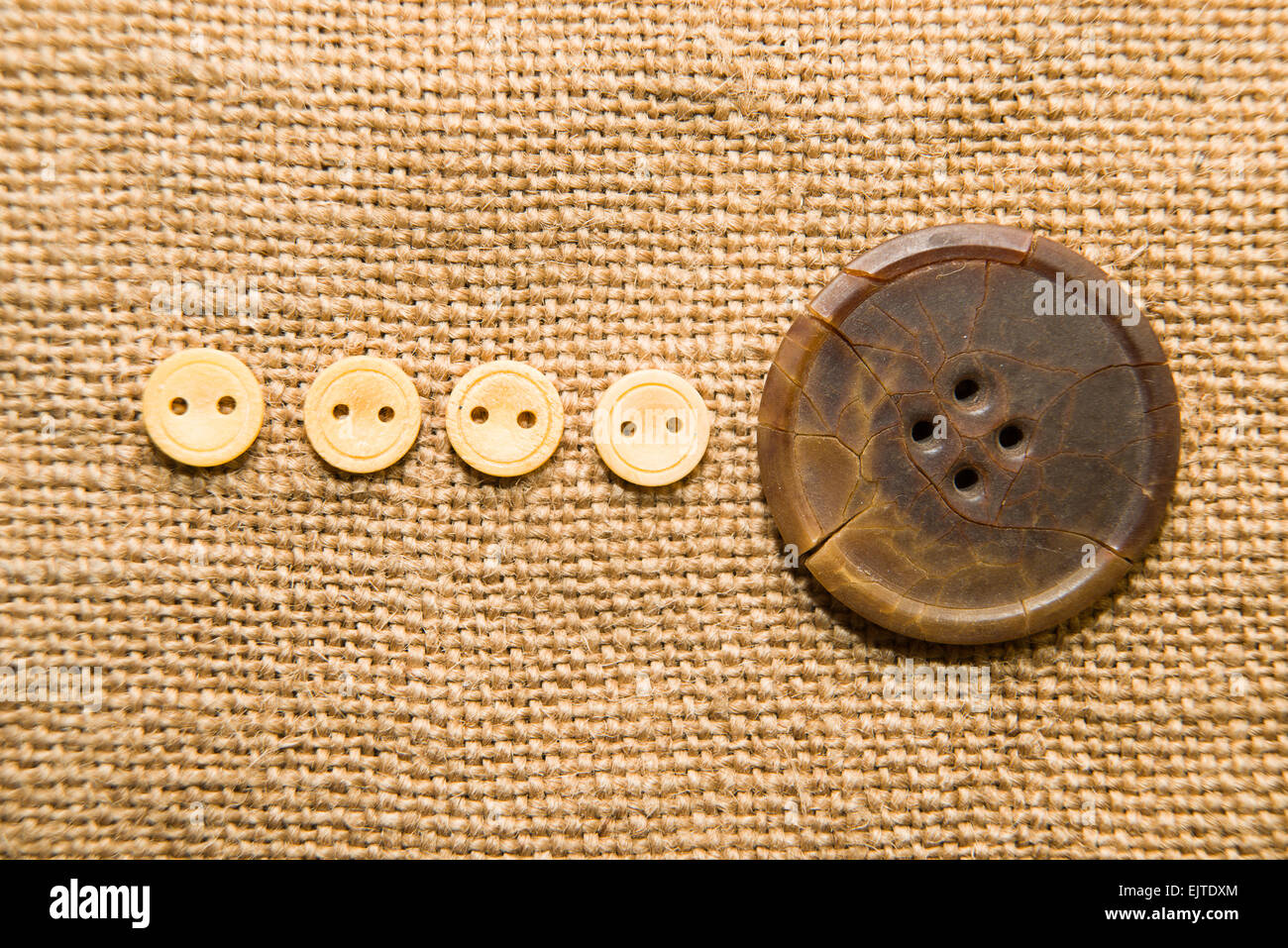 Cloth buttons hi-res stock photography and images - Alamy