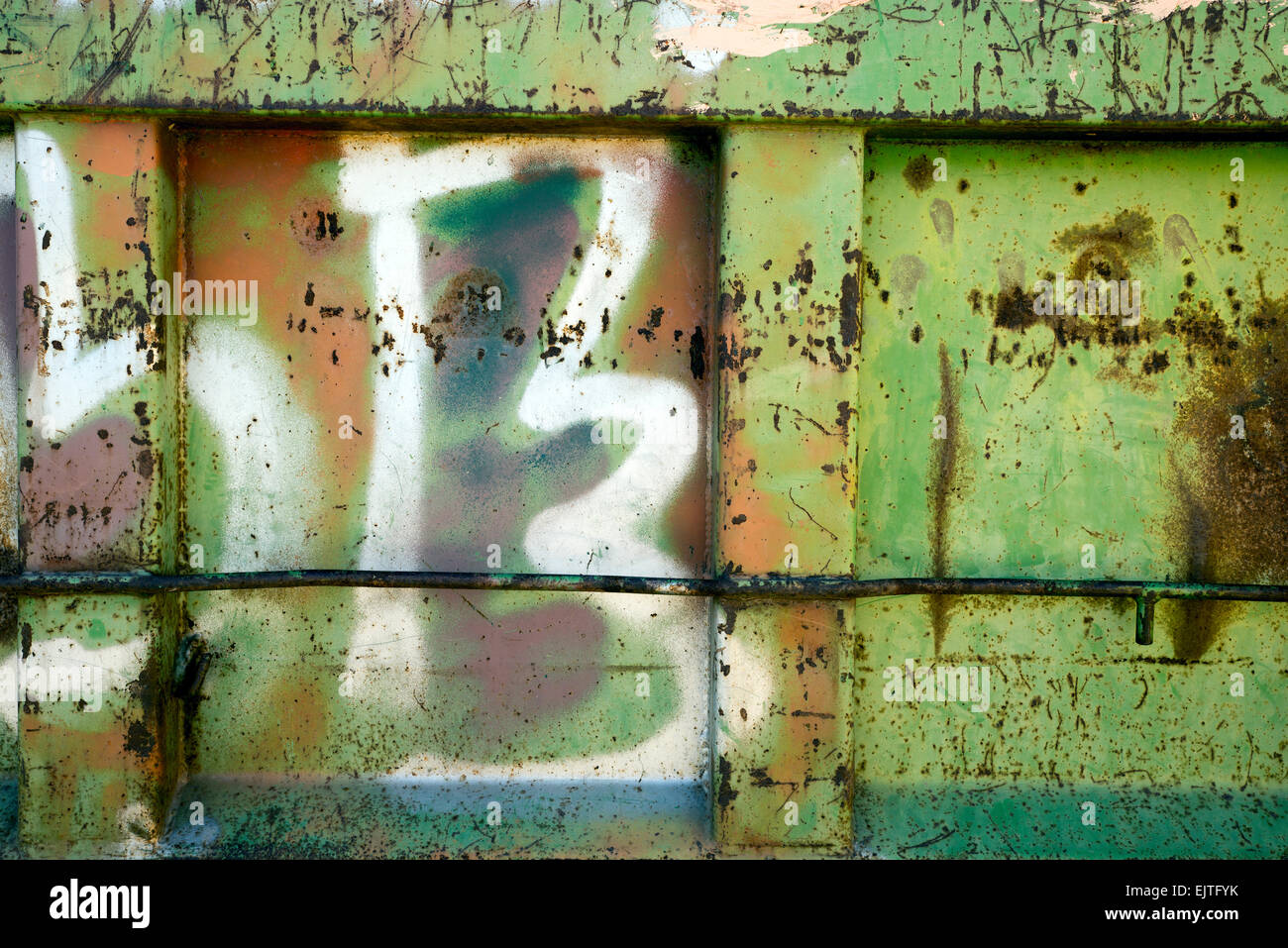 Closeup of graffiti on an old metal gate Stock Photo - Alamy