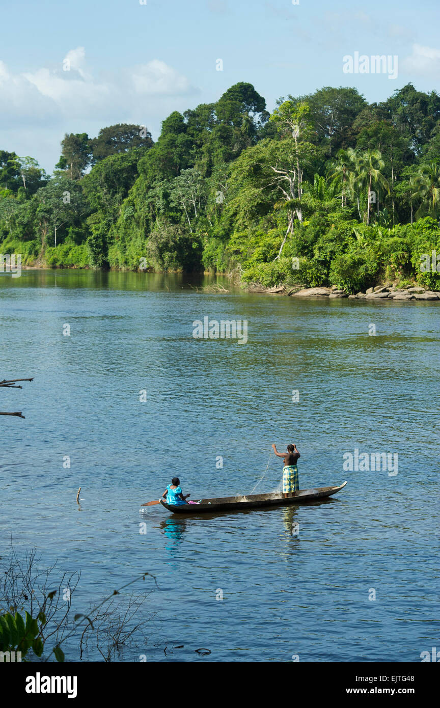 Maroon women fishing on the Upper Suriname River, Suriname Stock Photo ...