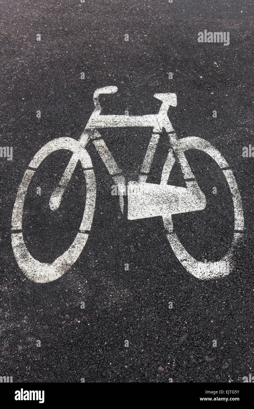 Symbol of bike path imprinted on the asphalt Stock Photo - Alamy